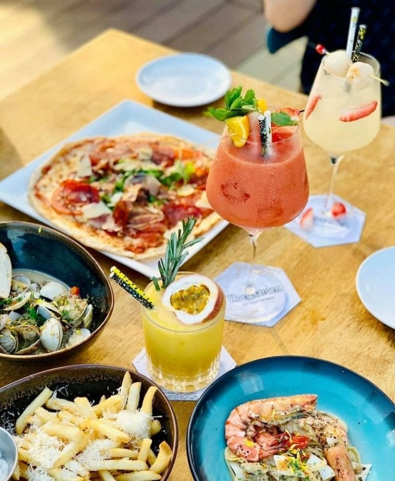 Dine by the sea, spot planes & admire the sunset at this vibey seaside ...