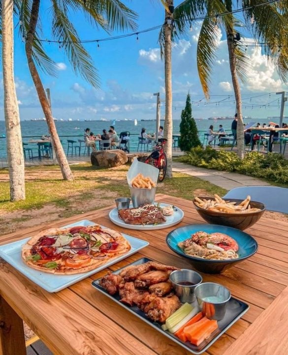 Dine by the sea, spot planes & admire the sunset at this vibey seaside ...